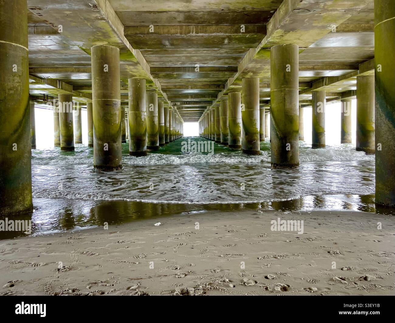 Under the pier Stock Photo - Alamy