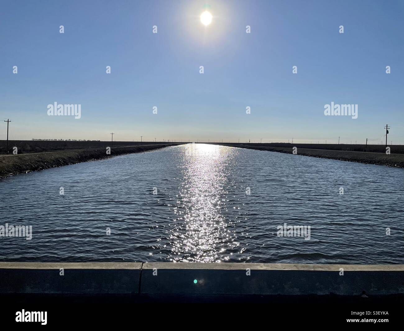 Earth lined canal Stock Photo - Alamy