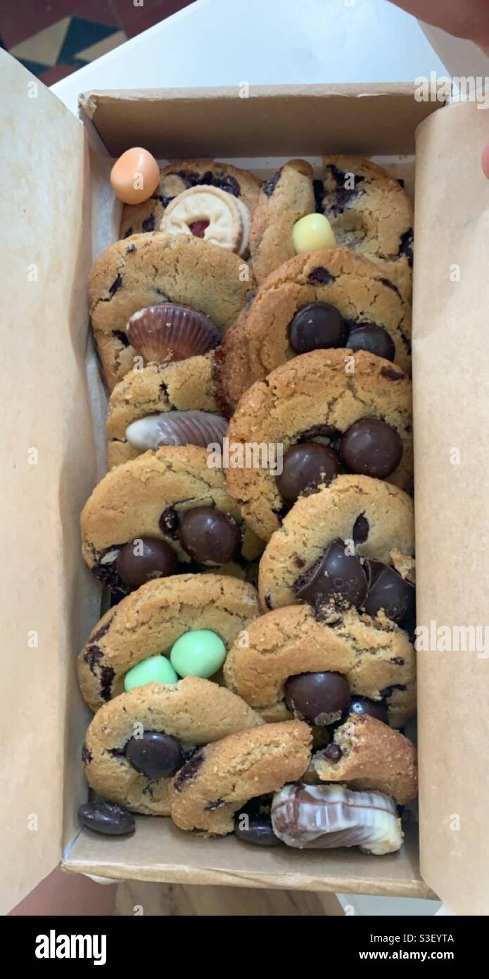 Closeup image of a box of mixed cookies Stock Photo - Alamy