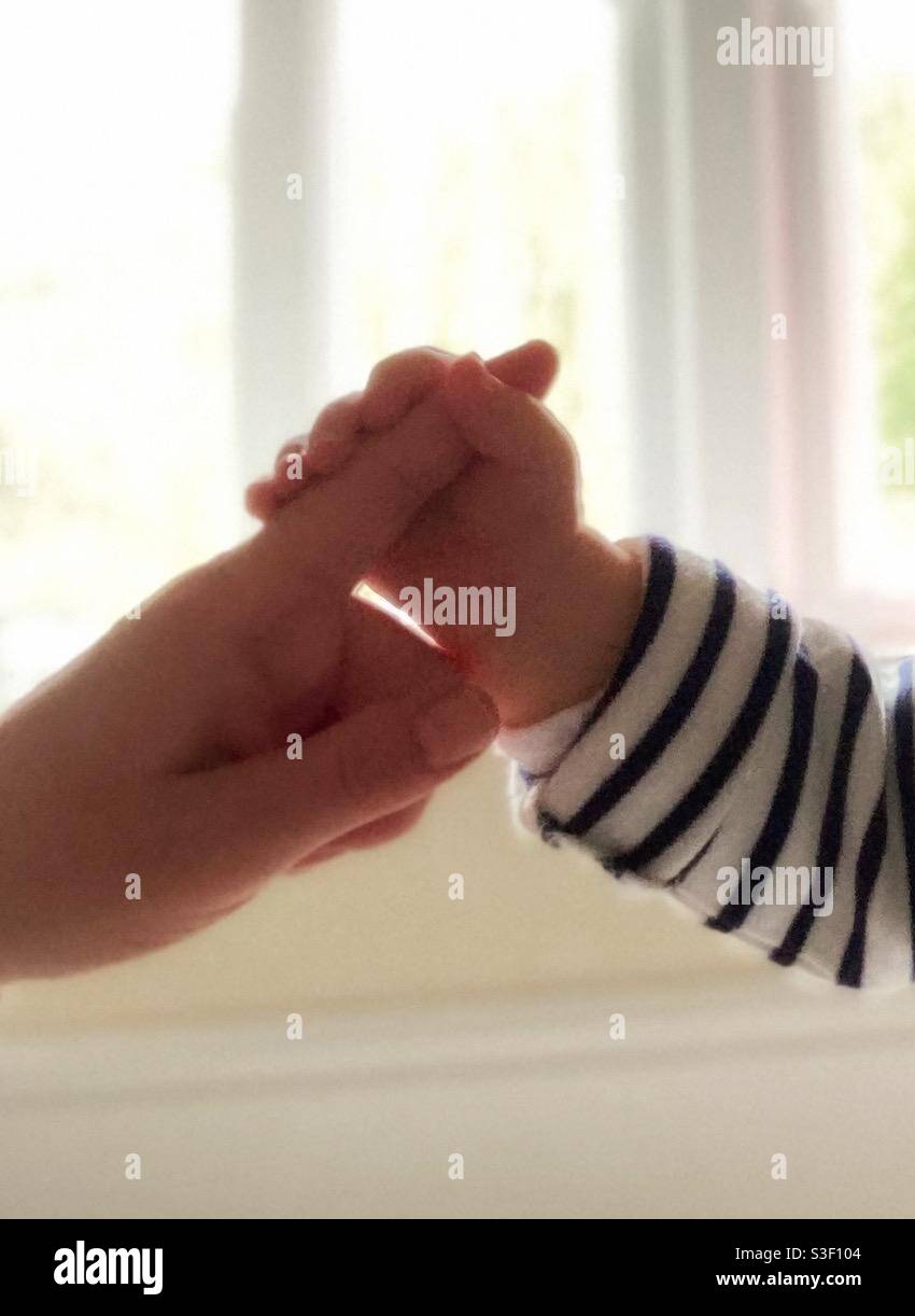 Baby pointing finger hi-res stock photography and images - Alamy