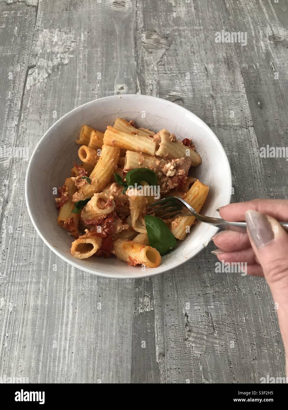 Woman eating pasta vintage hi-res stock photography and images - Alamy
