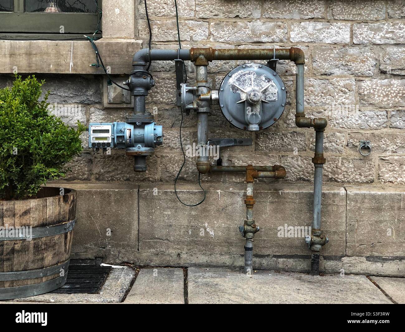 Natural gas meter and pressure regulator installed at the building in ...