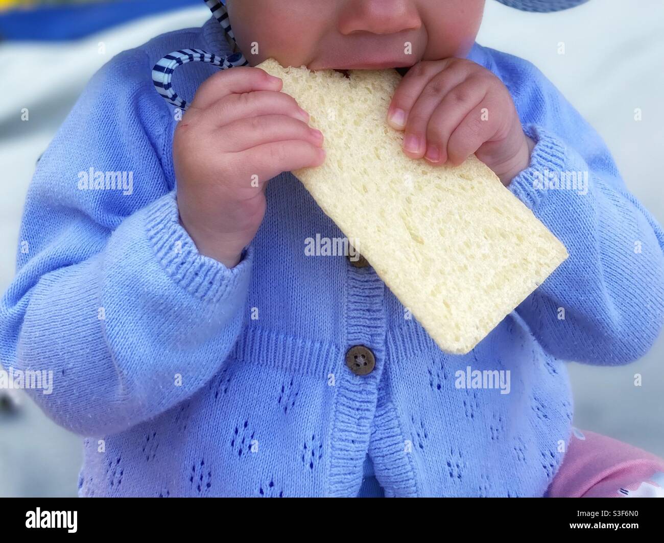 Infant toddler chewing food hi-res stock photography and images - Alamy