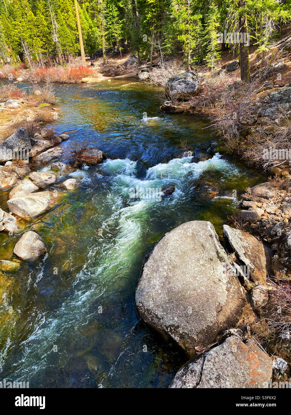 Mountain stream with boulders Stock Photo - Alamy