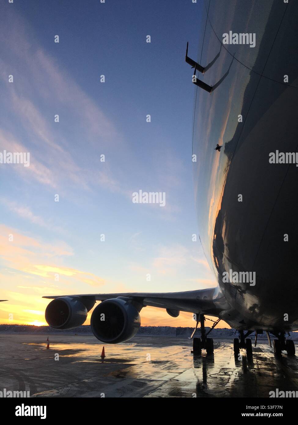 Sunset behind Boeing 747-800 at Anchorage International Airport Stock ...