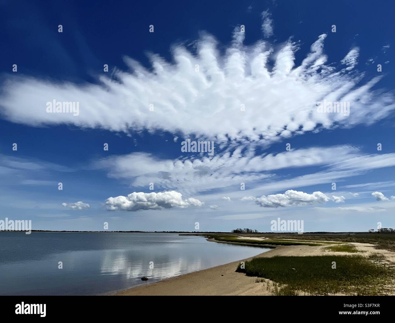 Still day with clouds on Orient NY beach Stock Photo - Alamy