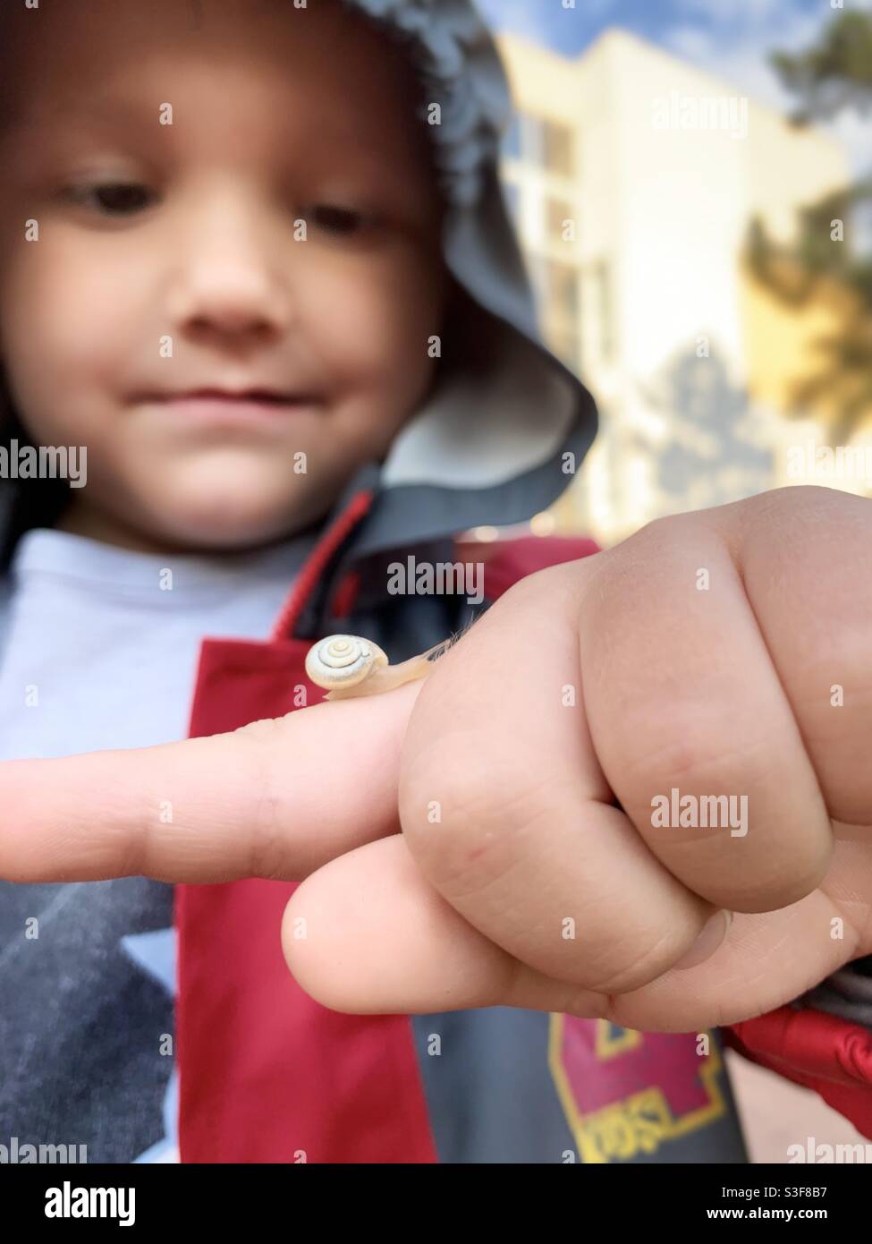 Child snail hi-res stock photography and images - Alamy