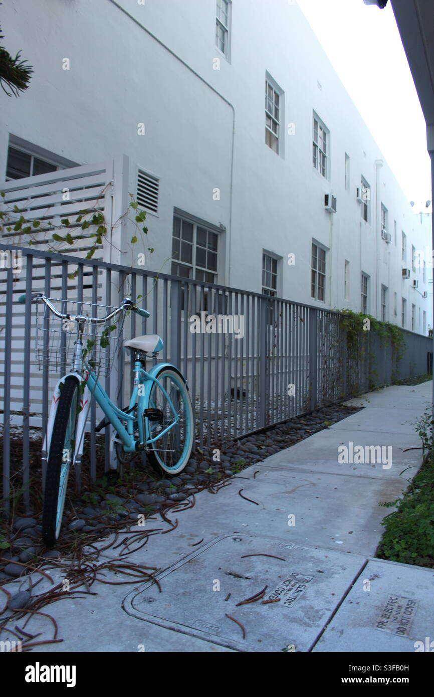 Bicycle and fence hi-res stock photography and images - Alamy