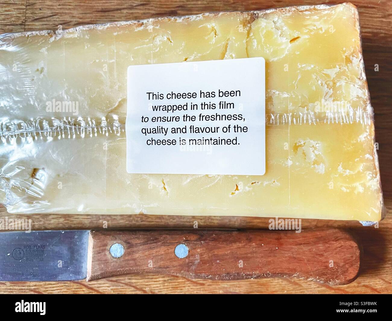 Wrapped cheese hi-res stock photography and images - Alamy