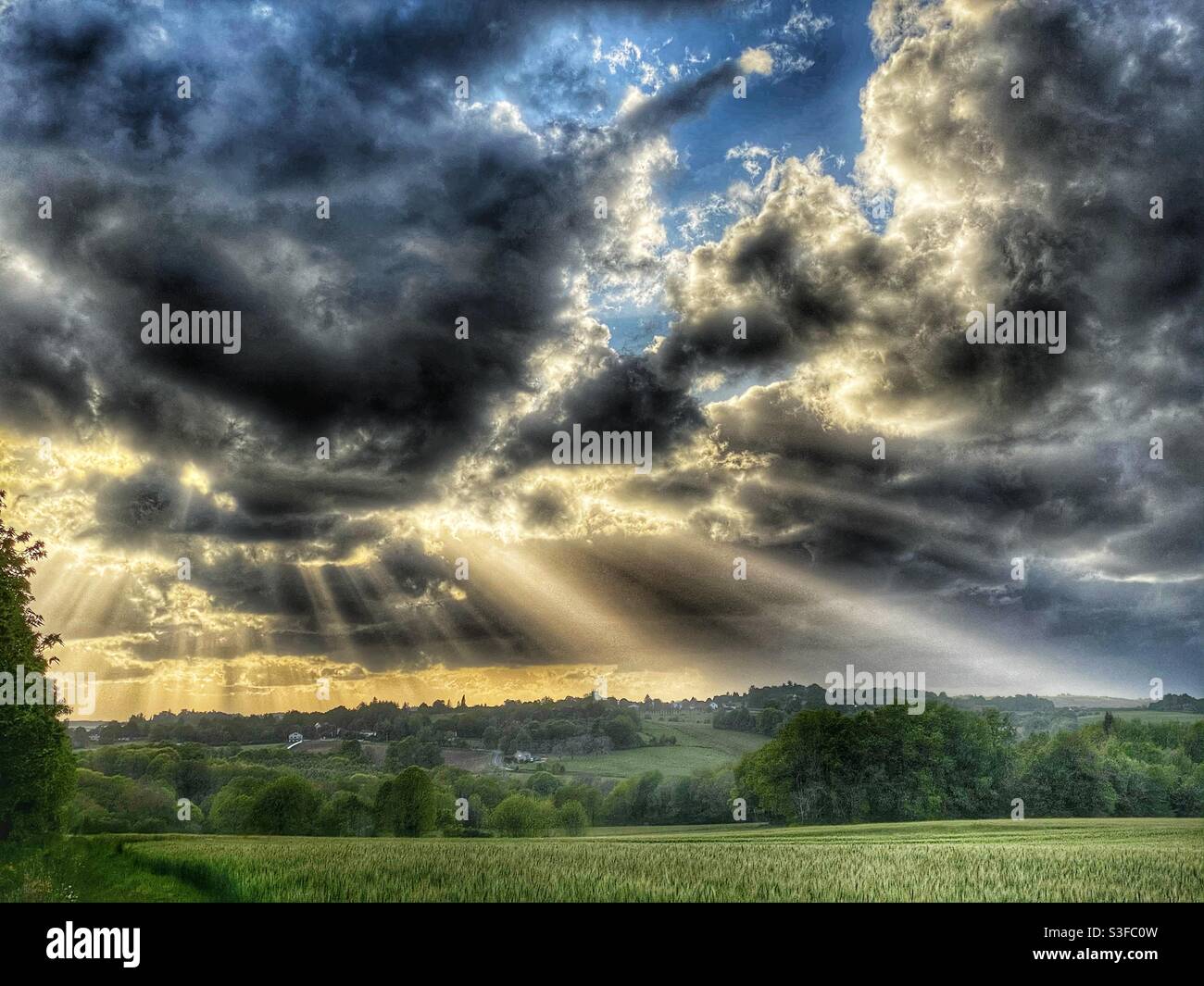 Sky with sun rays Stock Photo - Alamy