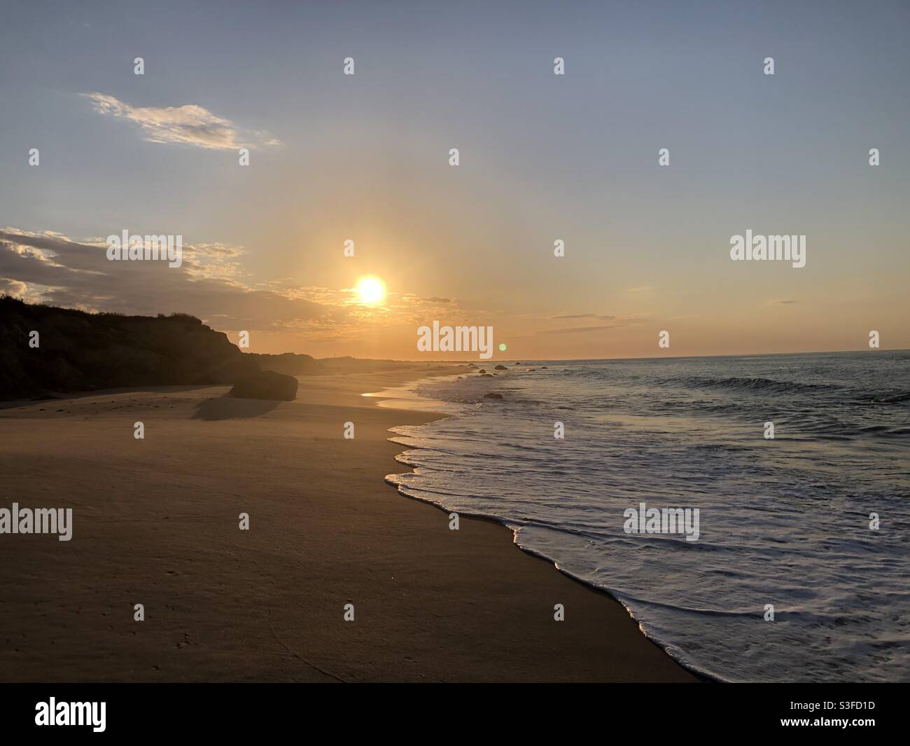 Sunrise at beach Stock Photo - Alamy
