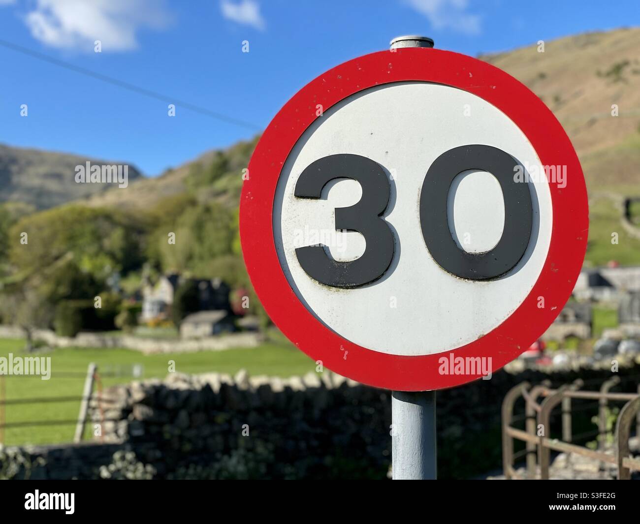 A 30mph traffic sign in the countryside Stock Photo - Alamy