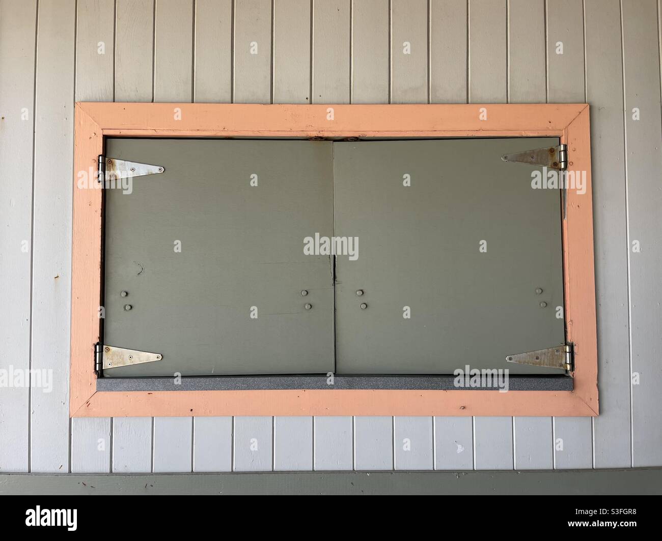 Outdoor colorful panel wood wall with window Stock Photo - Alamy
