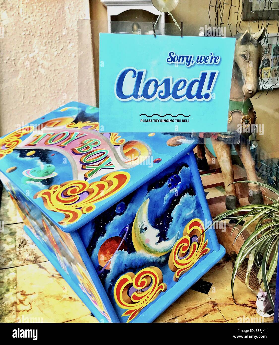 View through a toy shop window Stock Photo - Alamy