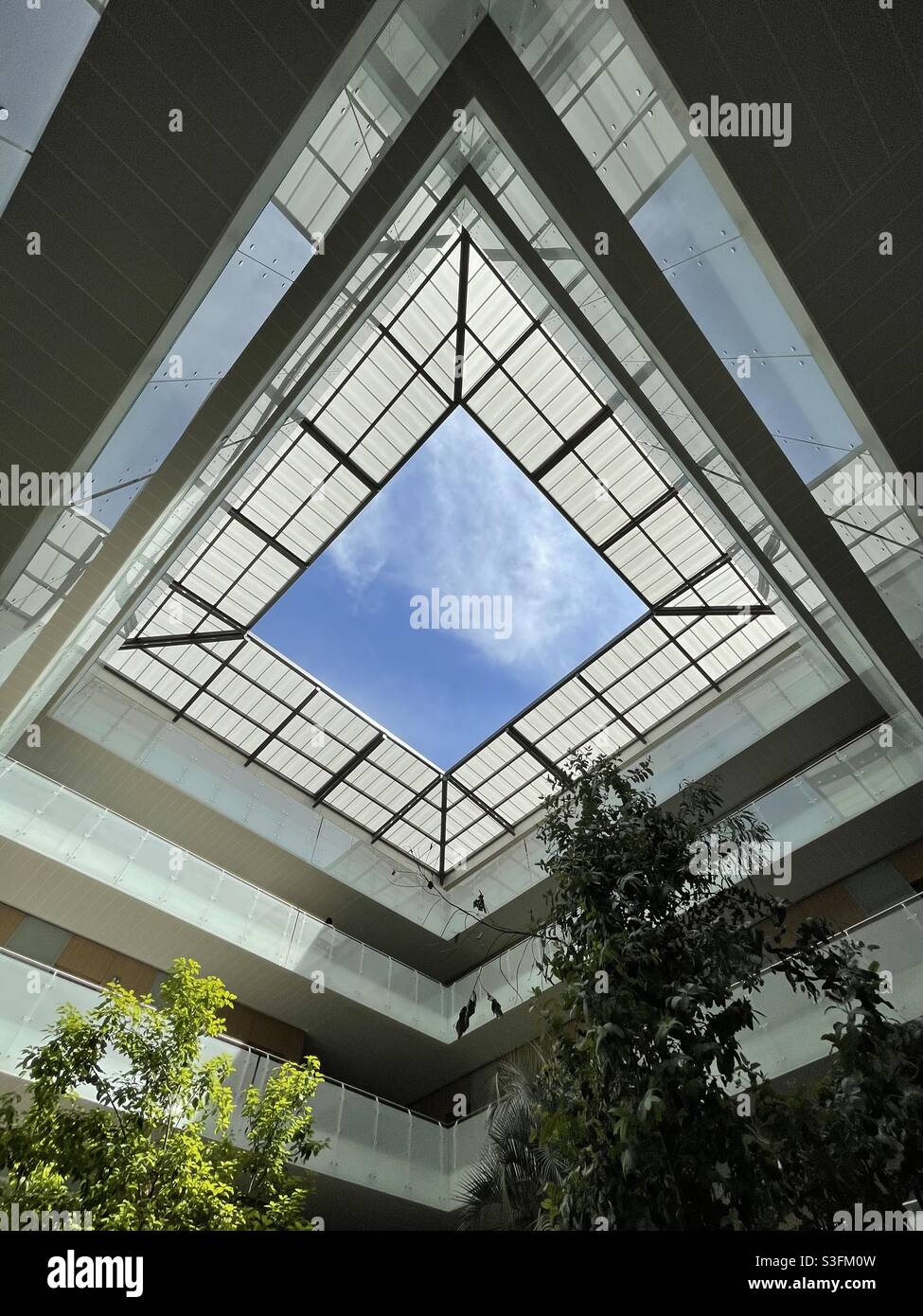 Square open sky atrium or courtyard in a white building in Montpellier ...