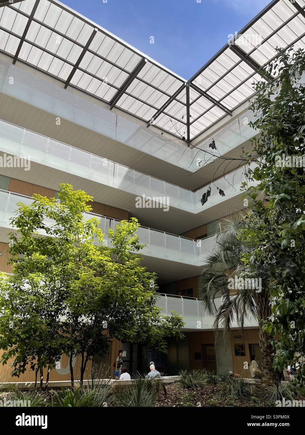 Square open sky courtyard in a modern white building in Montpellier ...