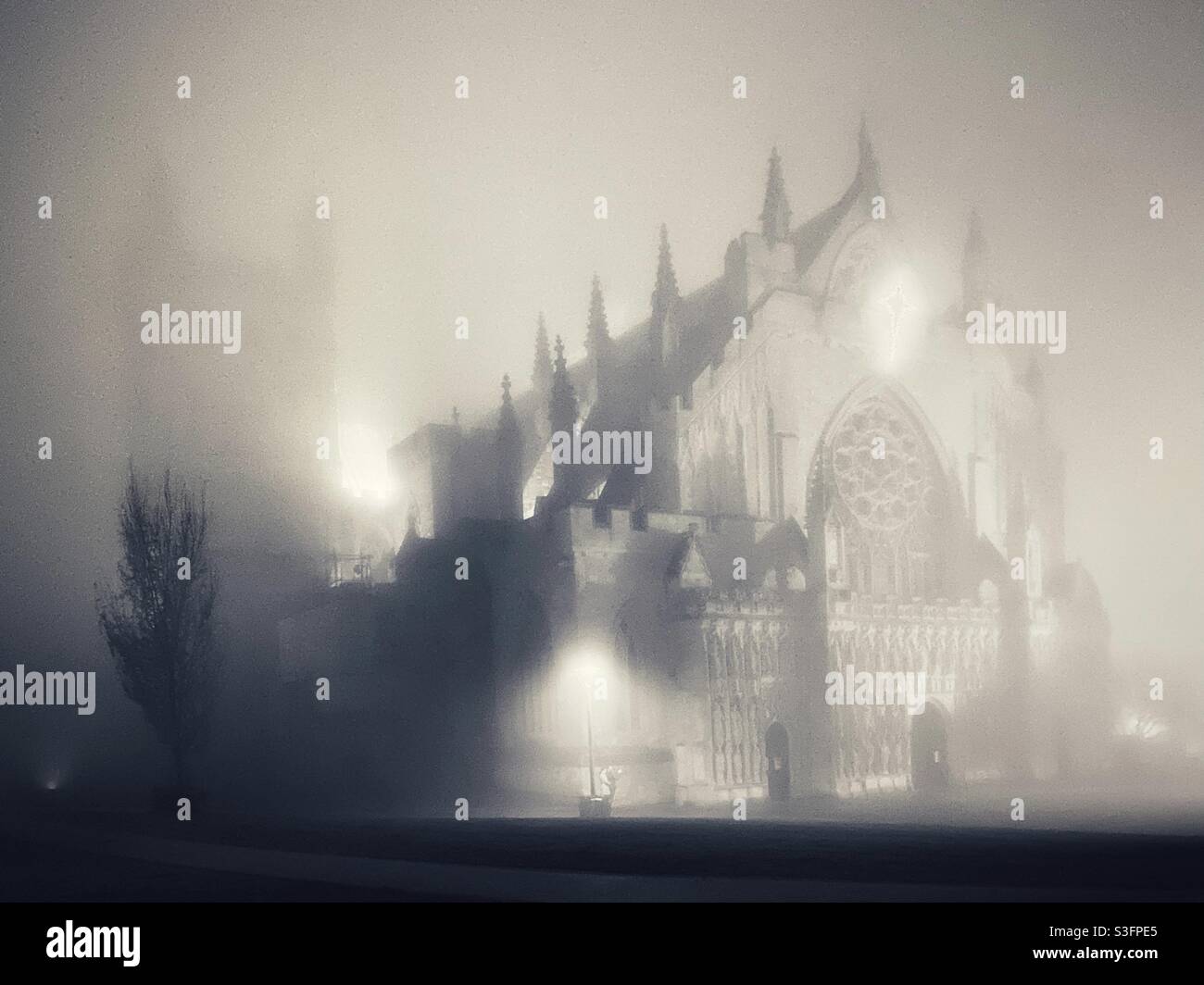Thick fog surrounds Exeter Cathedral in the city of Exeter, Devon, UK ...