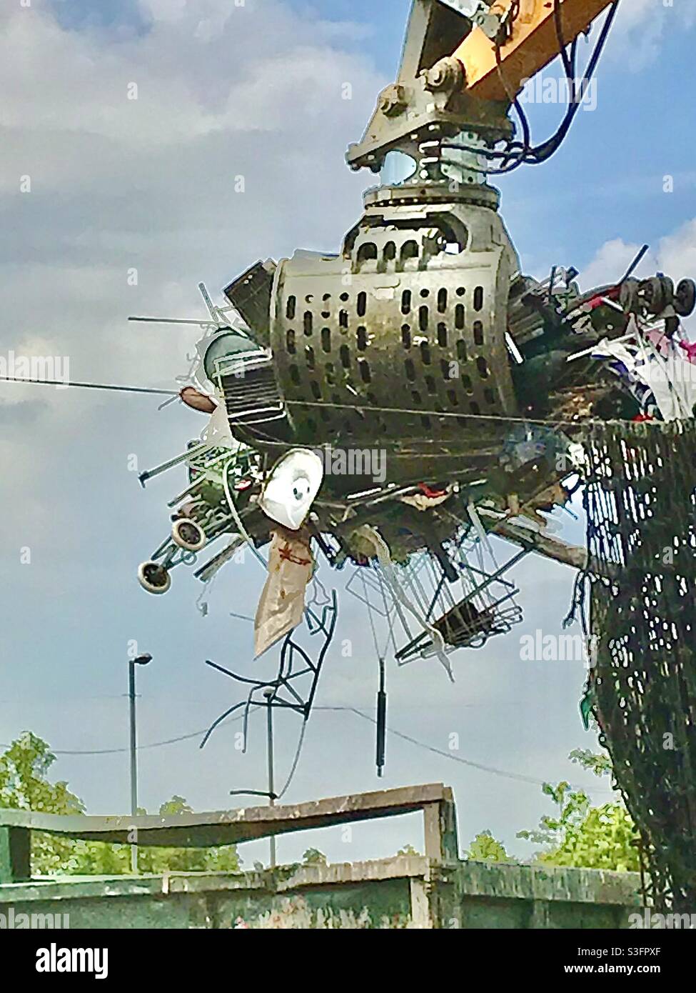 Collecting metal objects at the recycling centre Stock Photo - Alamy