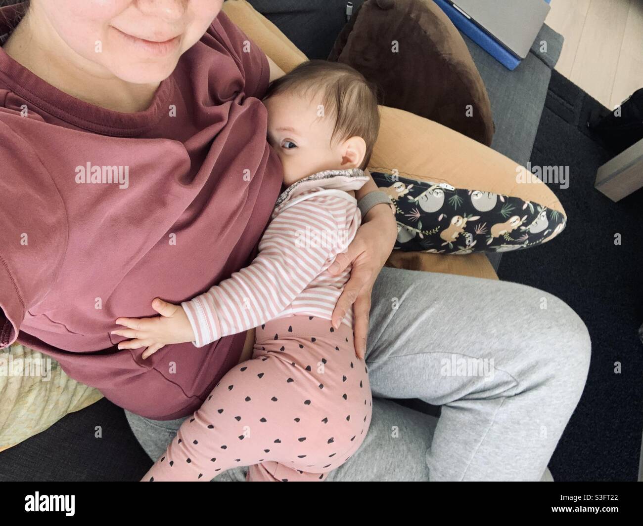 Woman breastfeeding her baby hi-res stock photography and images - Alamy