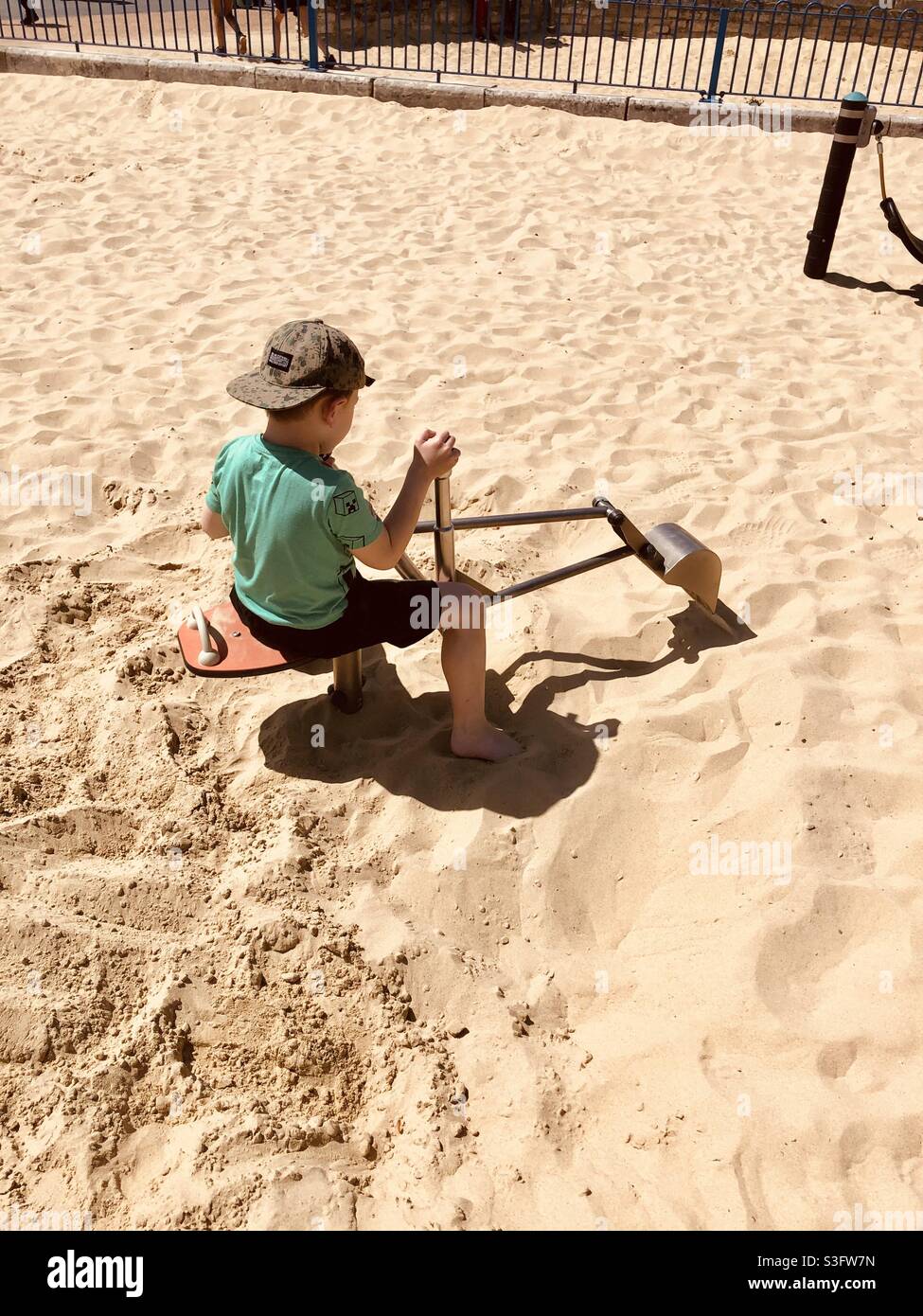Boy playing in sand hi-res stock photography and images - Alamy