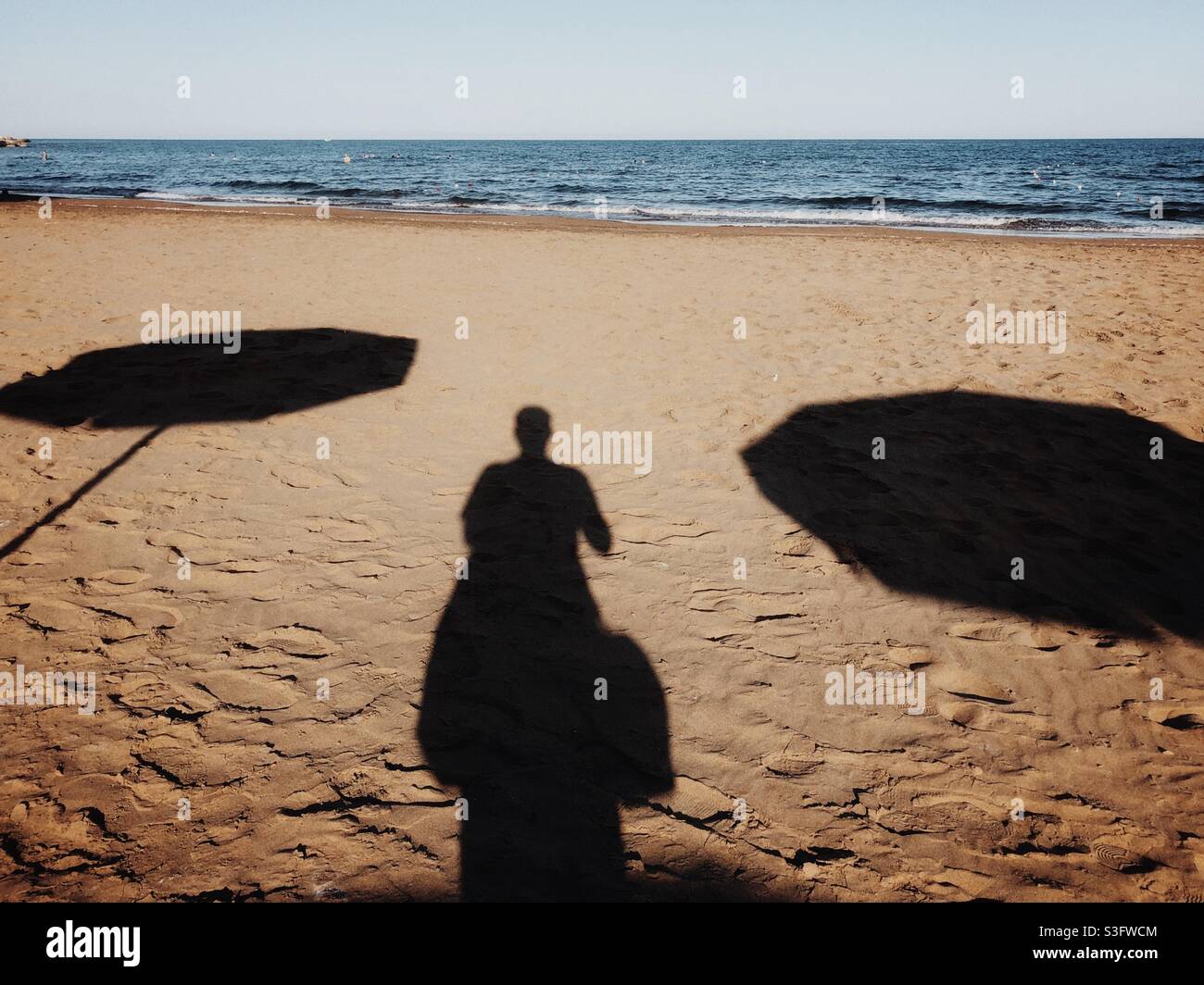 Mysterious beach shadow hi-res stock photography and images - Alamy