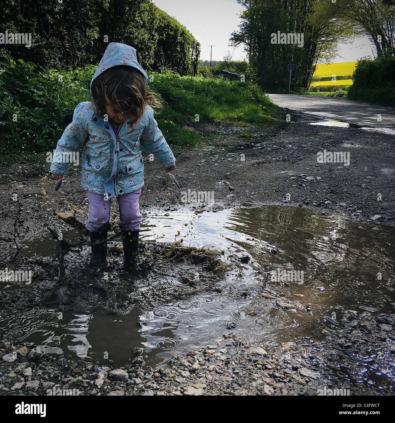 Outdoor puddle fun hi-res stock photography and images - Alamy