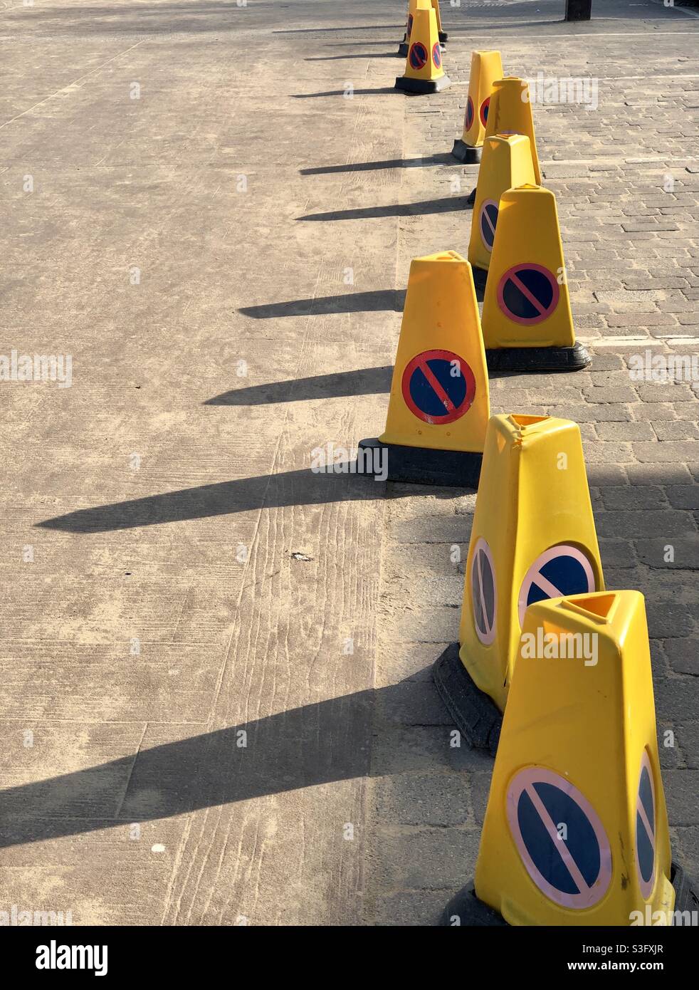 No waiting cones with long shadows Stock Photo - Alamy