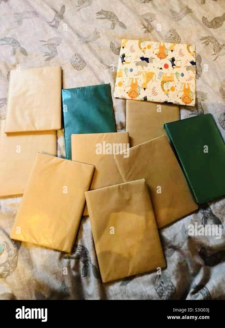 Wrapped books hi-res stock photography and images - Alamy