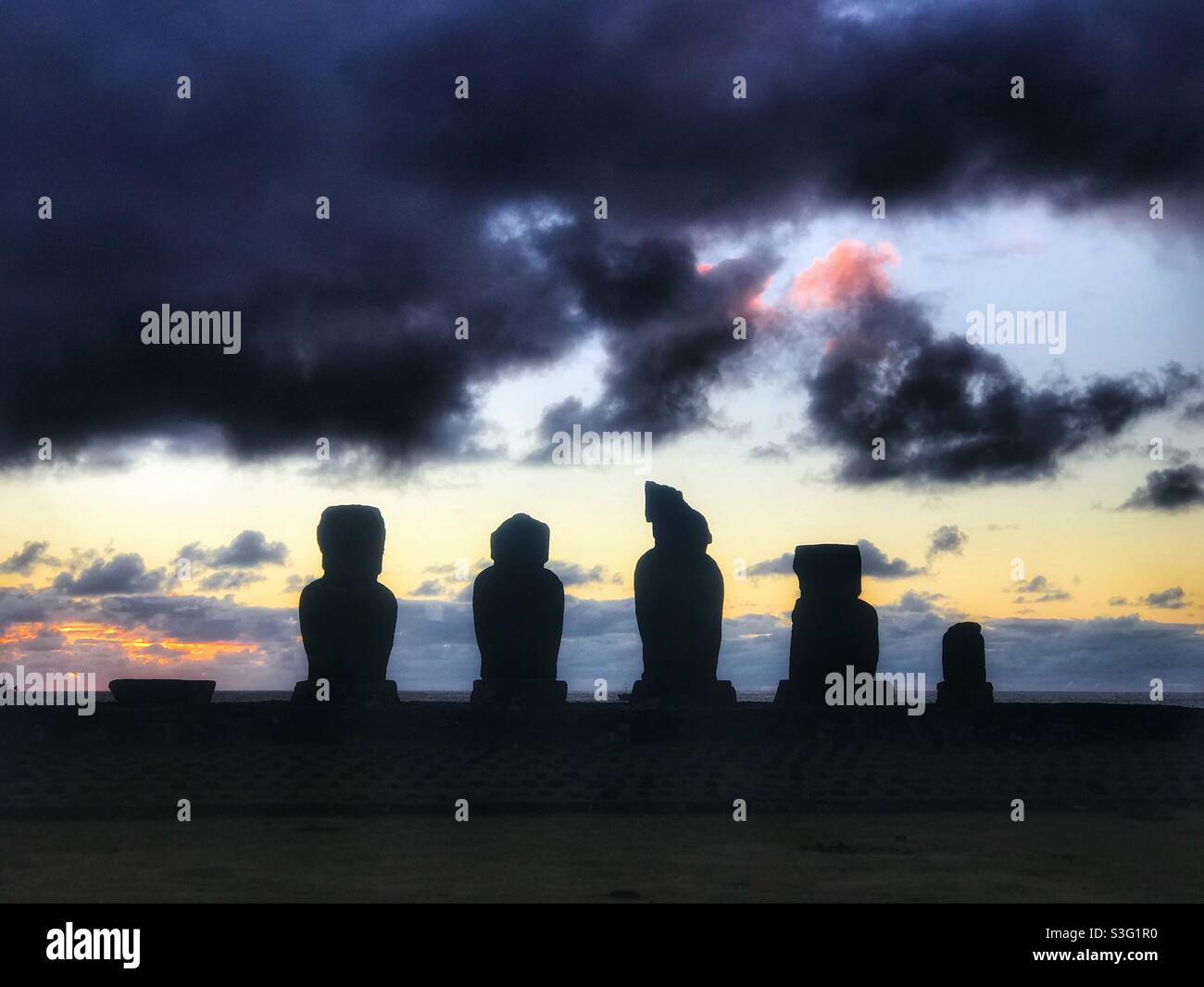 Moai at sunset, Tahai, Easter Island, Chile Stock Photo - Alamy