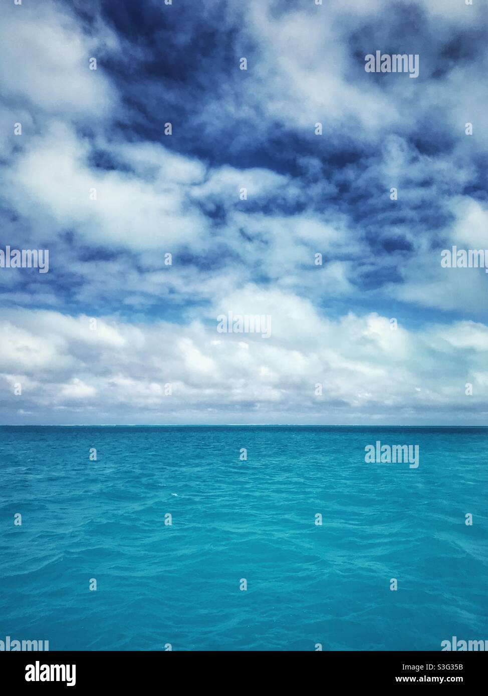 Cloudy sky over the lagoon, Aitutaki, Cook Islands Stock Photo - Alamy