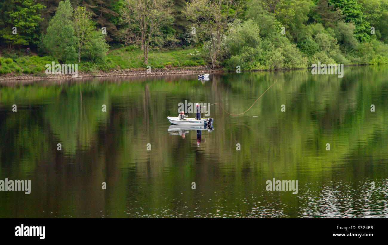 Casting line fishing boat hi-res stock photography and images - Alamy
