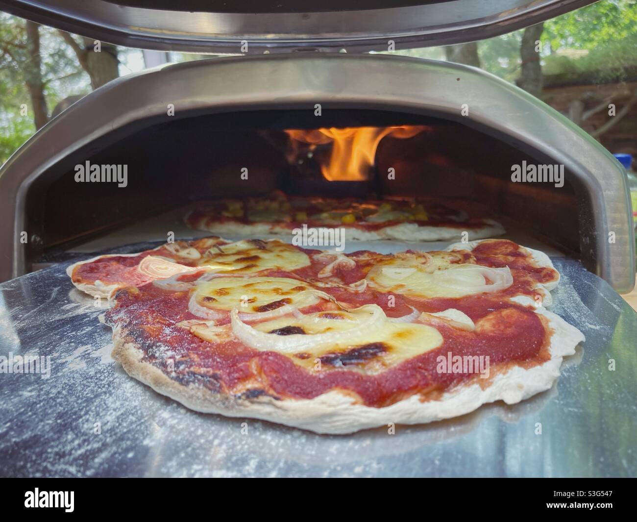 Pizza fire hi-res stock photography and images - Alamy