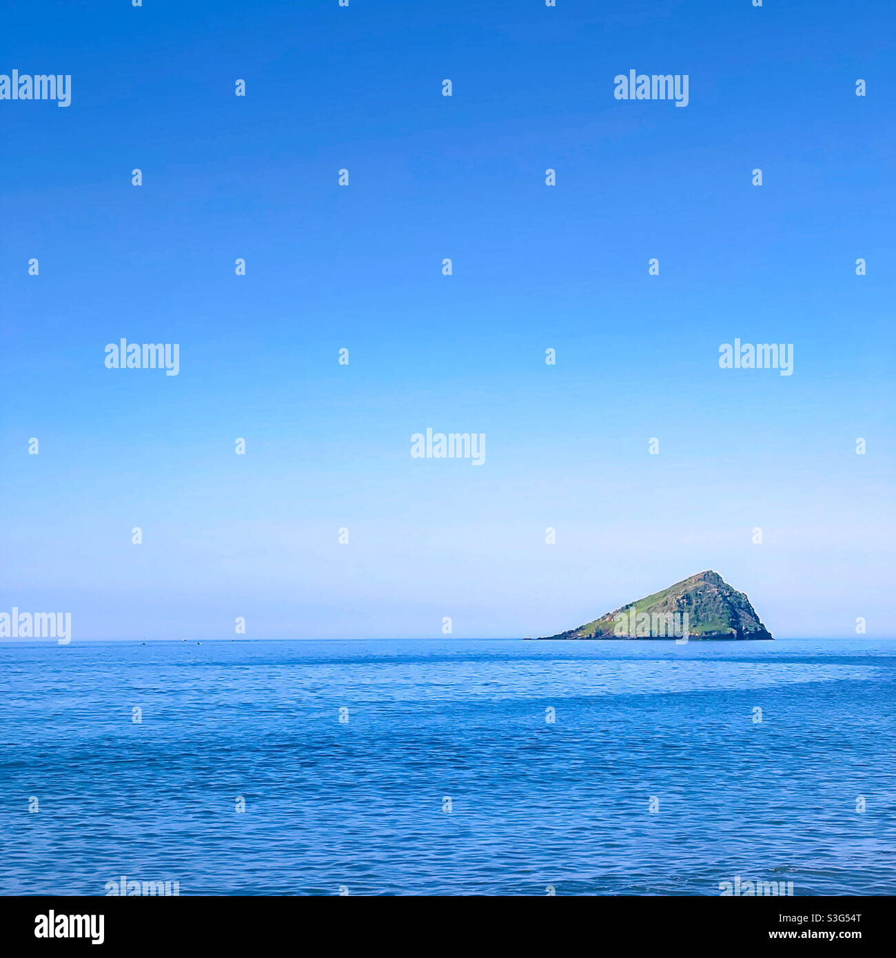 Island in the sea Stock Photo - Alamy