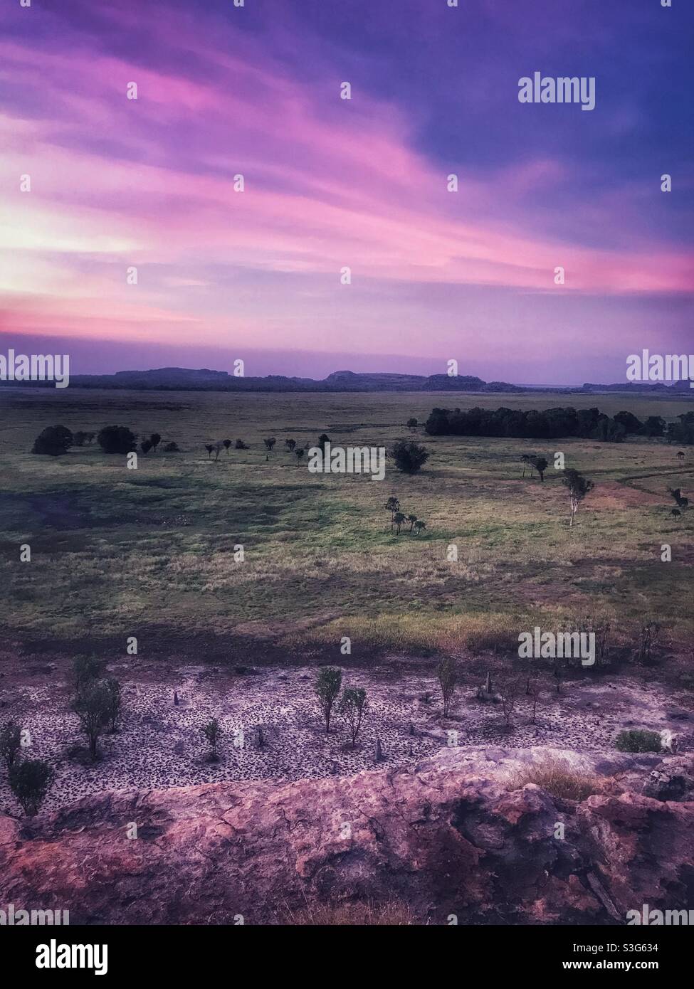 Sunset view over the Nadab floodplain from the Ubirr Rock lookout point in Kakadu National Park ...