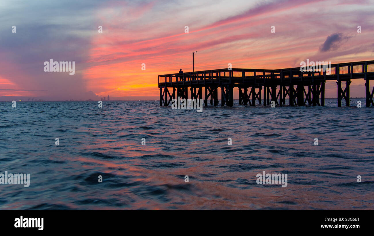 Pier at sunset Stock Photo - Alamy