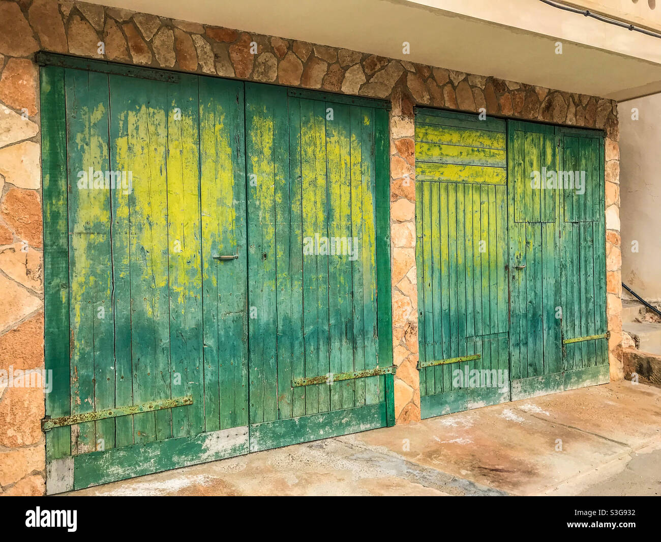 Old boat house doors, Mallorca Stock Photo - Alamy