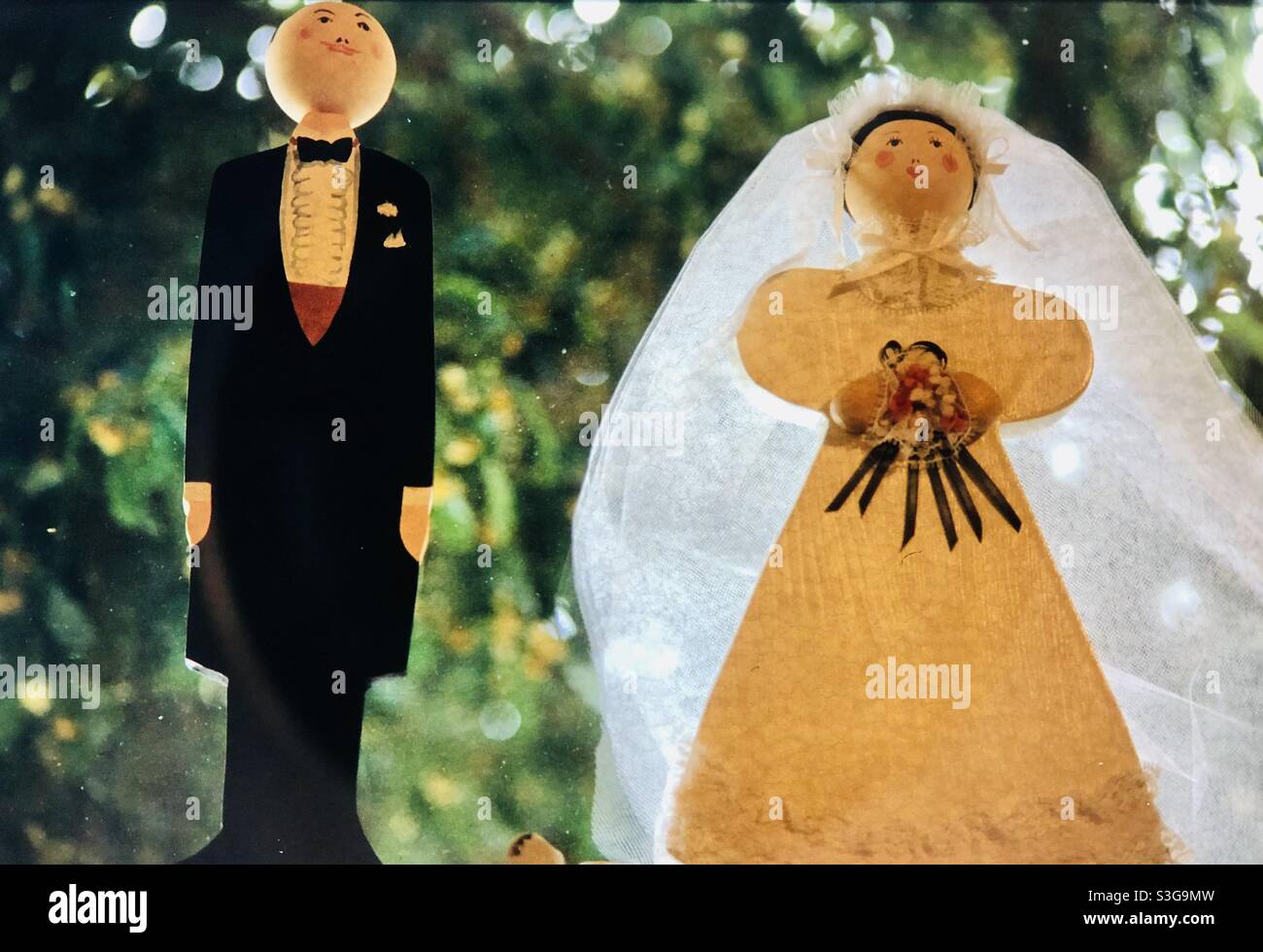 Bride and Groom wedding cake toppers handmade from wood Stock Photo - Alamy