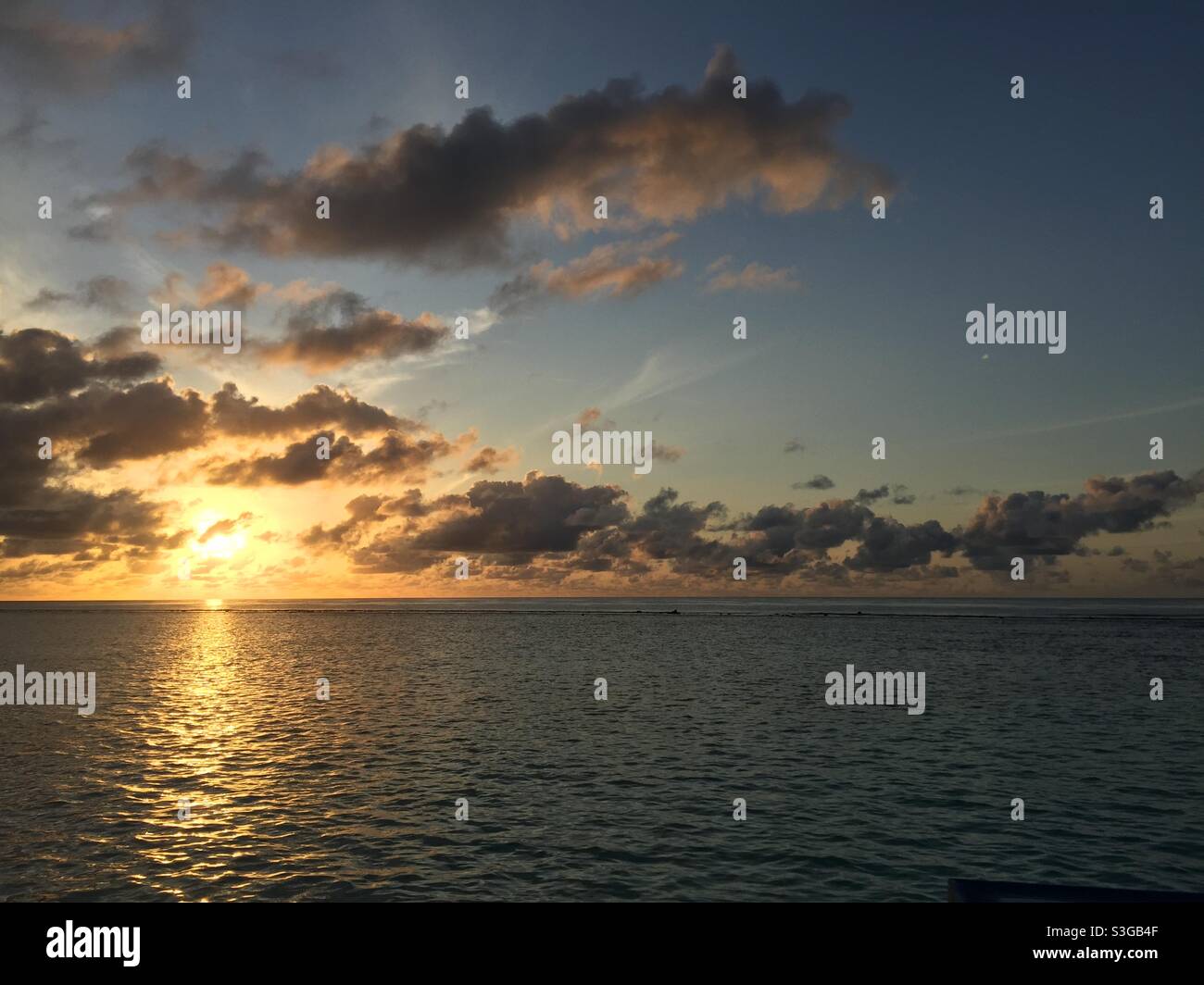 Cloudy sunset over the ocean, south ari atoll, Maldives Stock Photo - Alamy