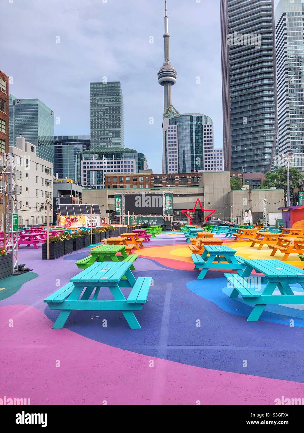 A colourful outdoor patio in downtown Toronto, Canada, among ...