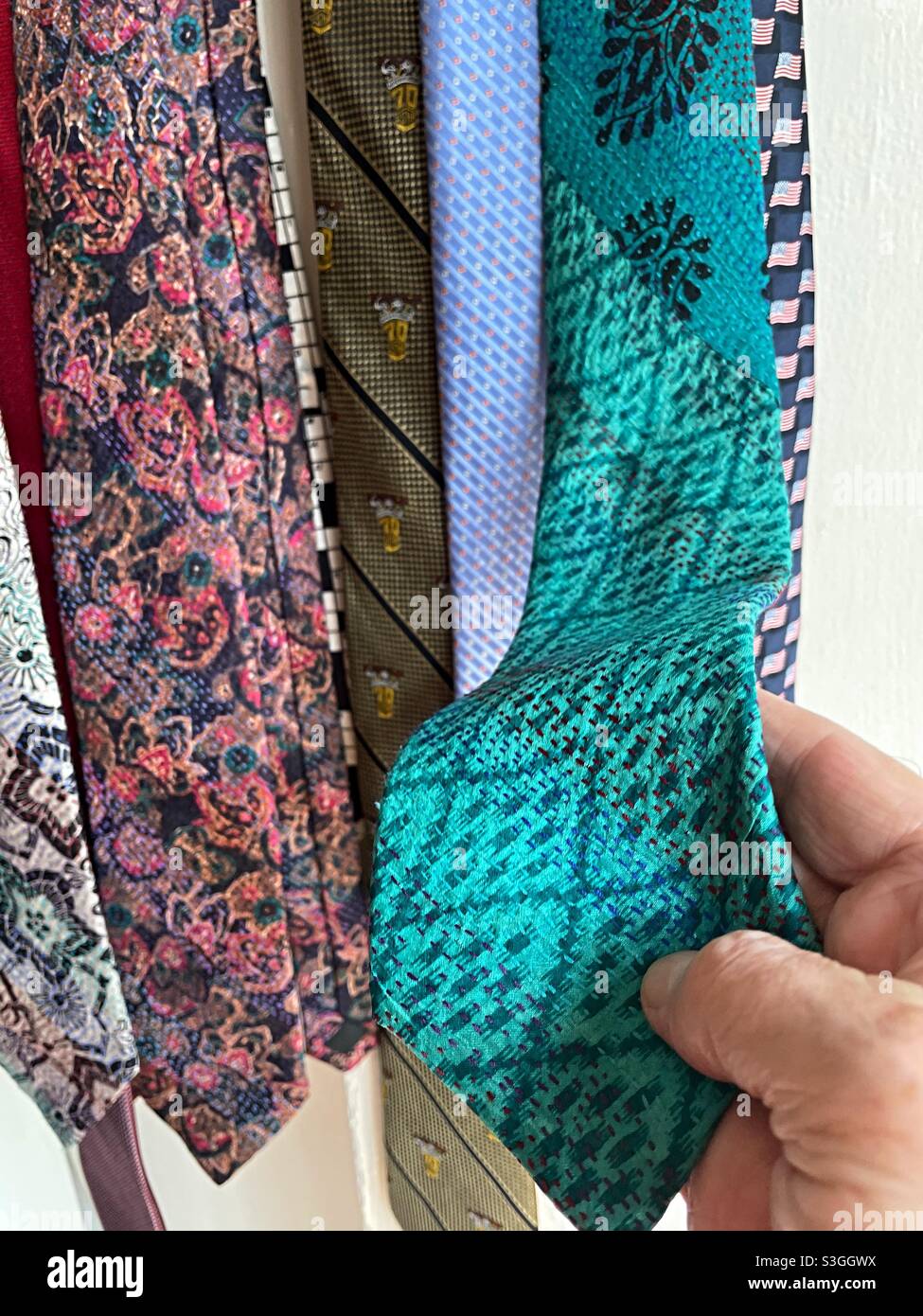 Hanging ties hi-res stock photography and images - Alamy