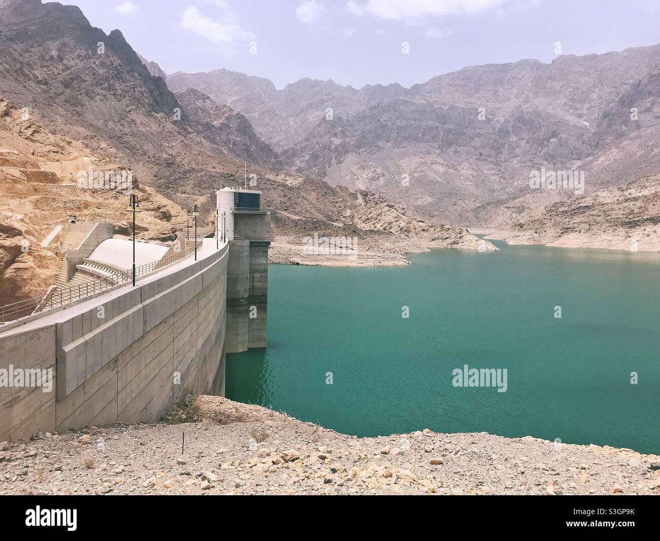 Wadi Dhiqa water Dam, Oman:with low level of water in mid summer Stock ...