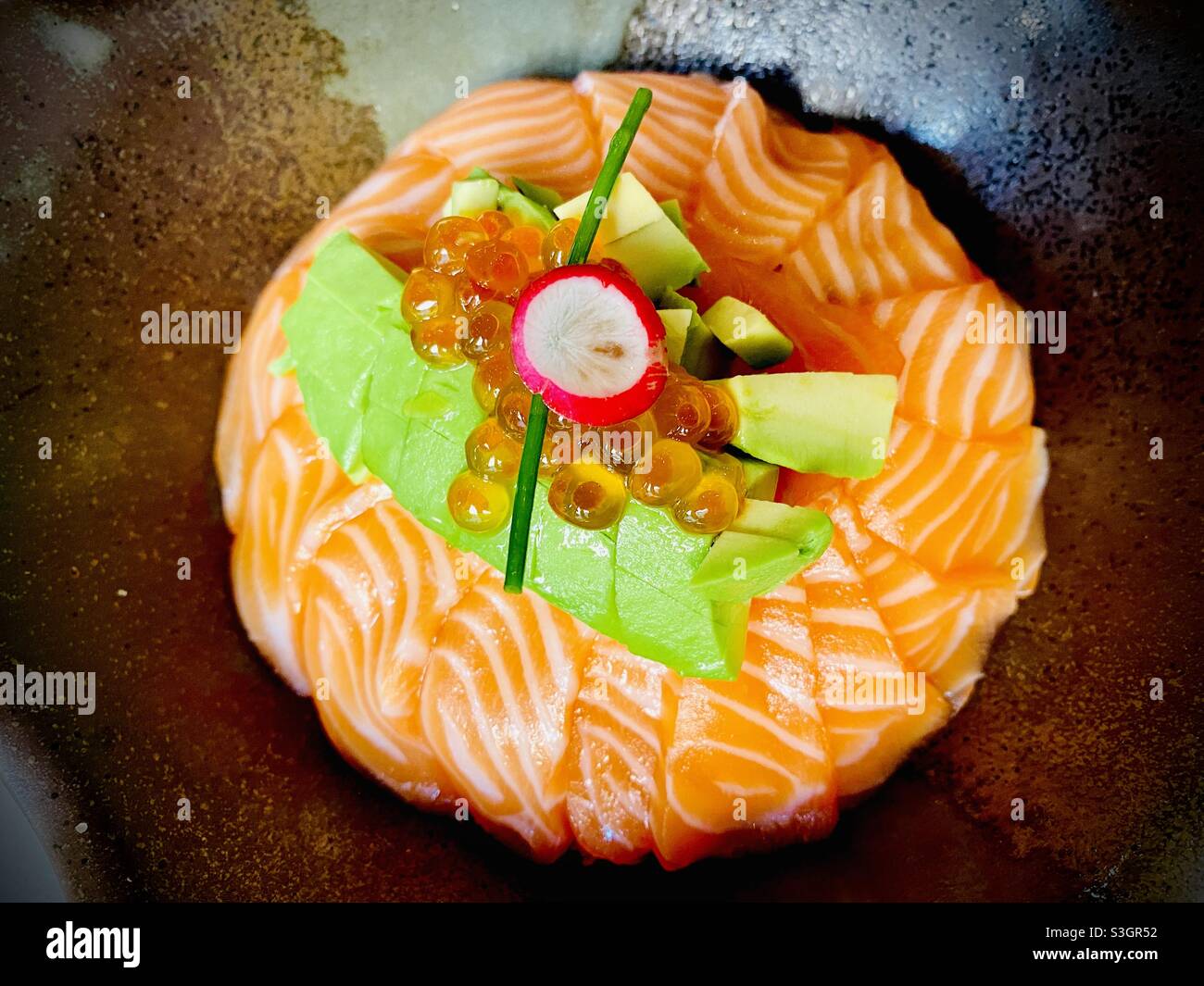 Salmon sashimi bowl Stock Photo - Alamy