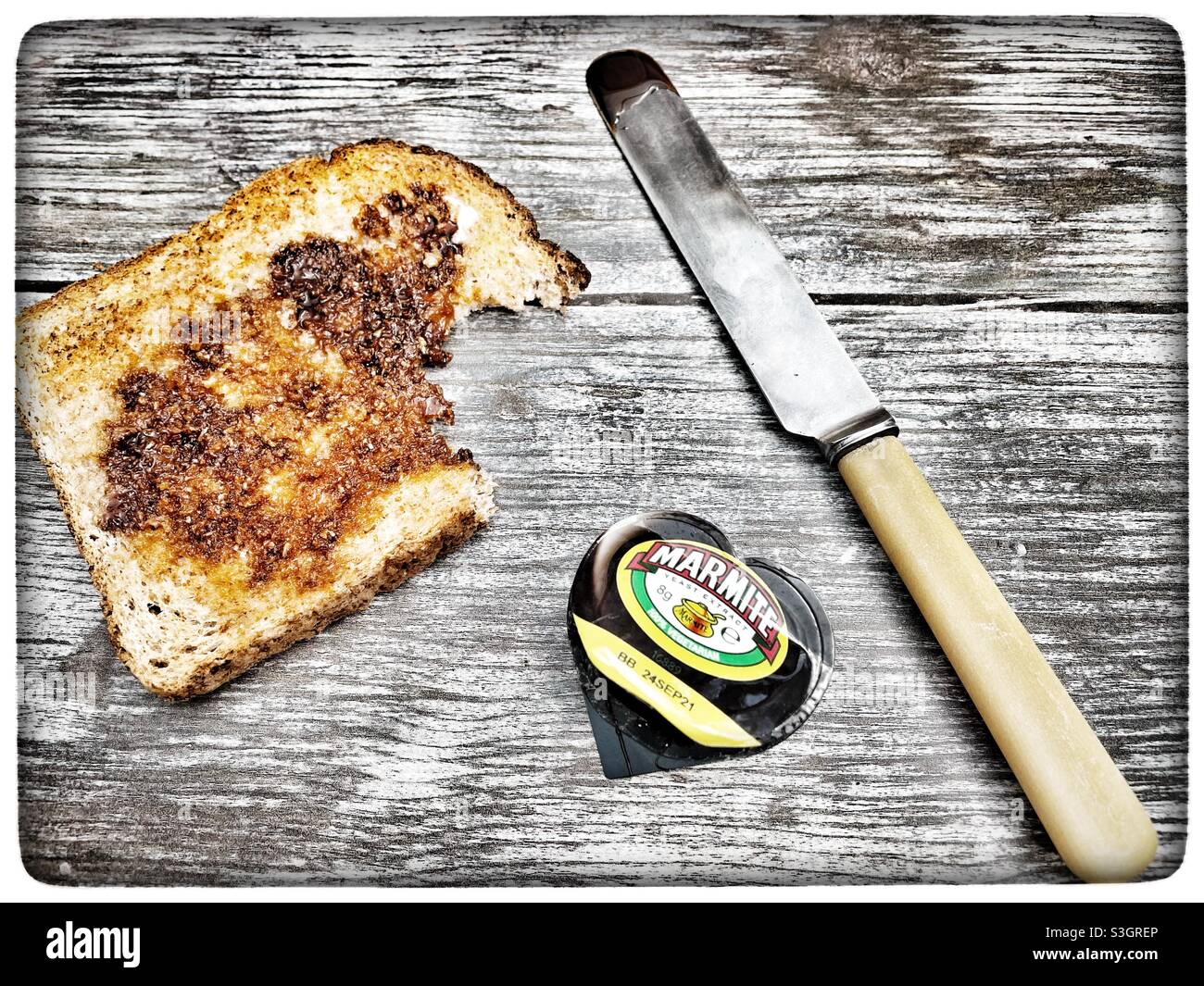 Marmite on whole meal toast Stock Photo - Alamy