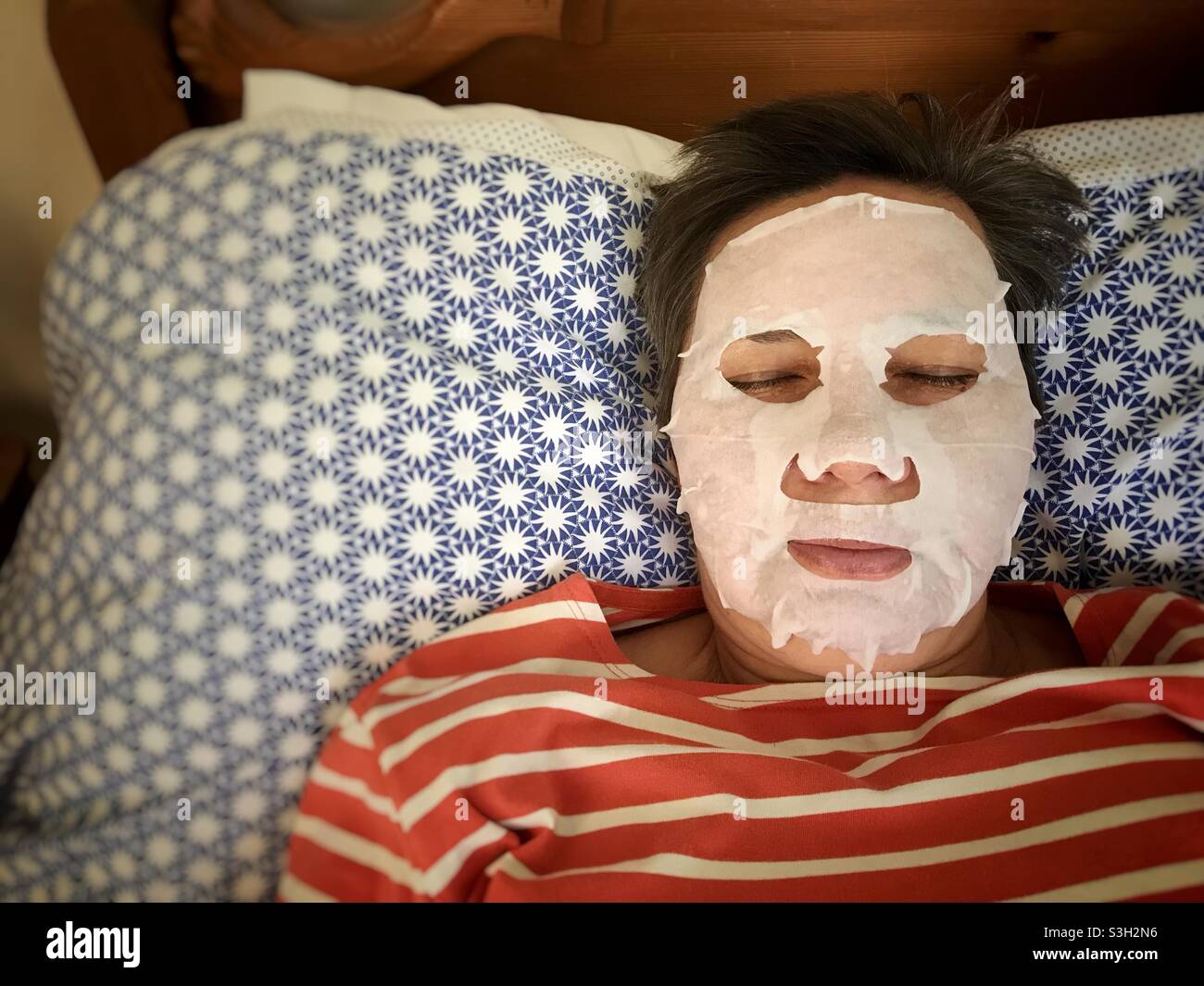 Woman and facial treatment hi-res stock photography and images - Alamy