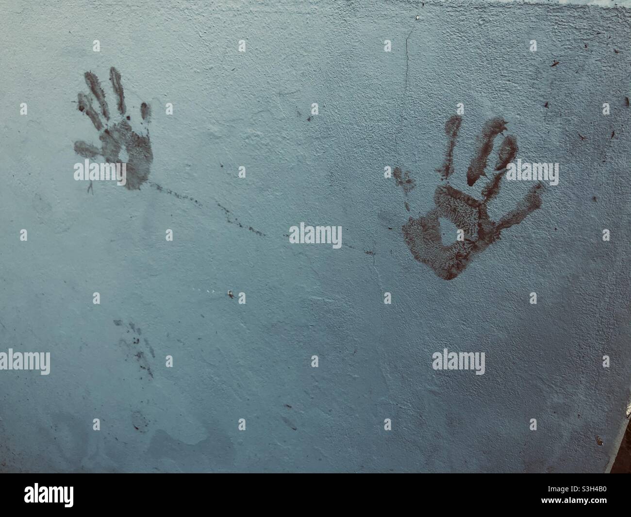 Muddy hand prints hi-res stock photography and images - Alamy