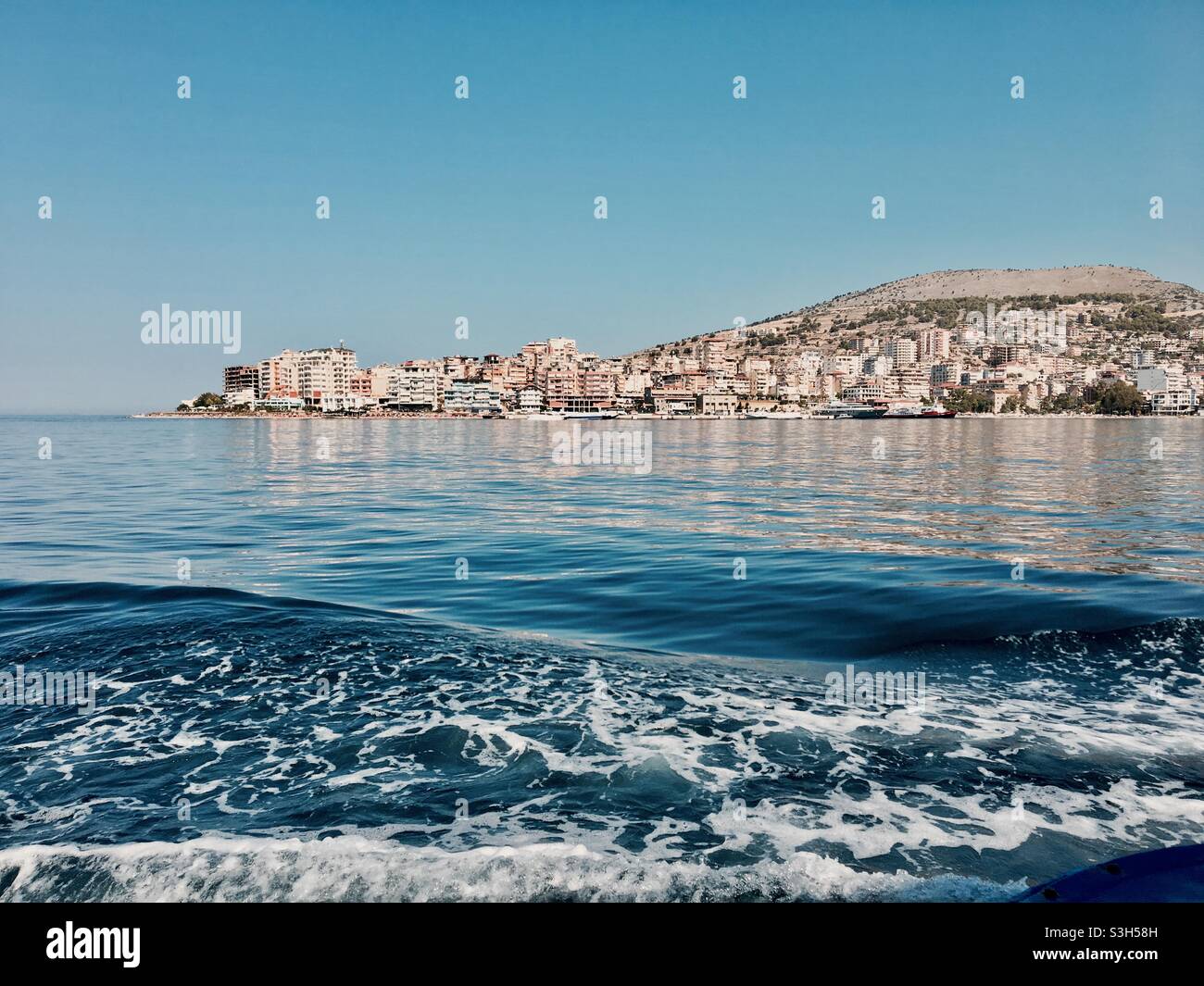 Albanian town of Sarandë from the sea Stock Photo - Alamy