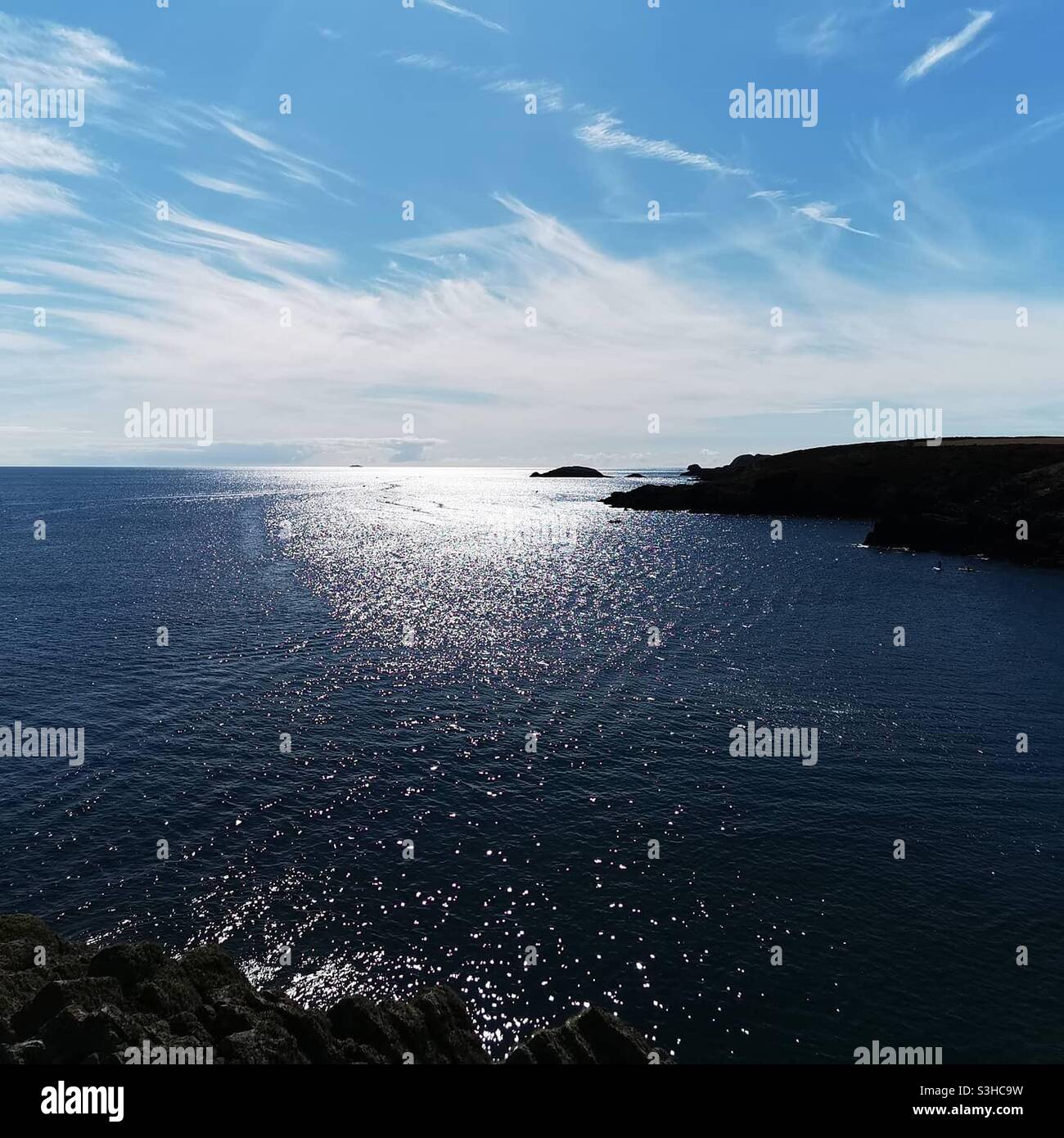 Sun reflecting off the sea Stock Photo - Alamy