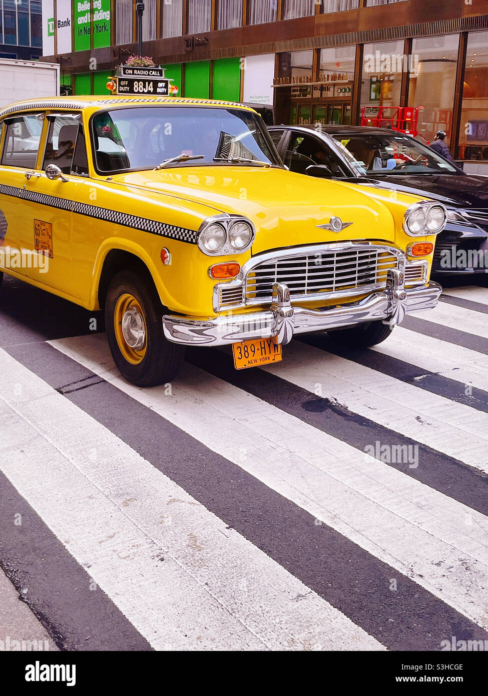 A vintage checker cab parked in a New York City St. crosswalk, 2021 ...