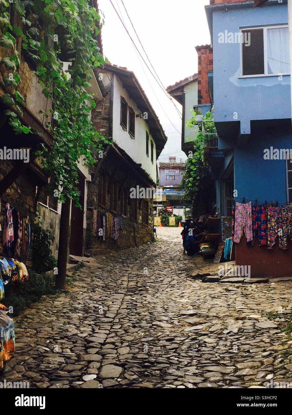 A path paved with natural stone between the old buildings in Turkey ...