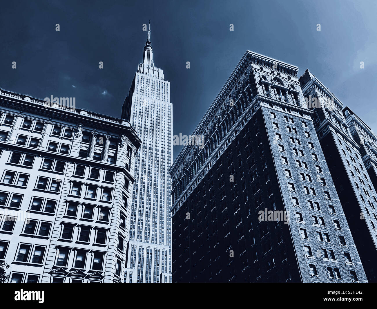 The Empire State building and the apartment building of Herald Towers ...